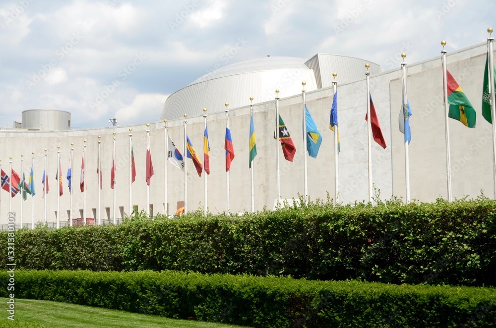 Flags from many different countries in front of the United Nations ...