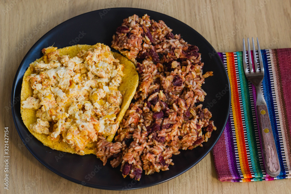 Calentado and huevos pericos con arepa is a traditional breakfast from ...