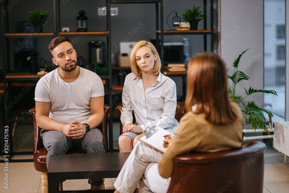 healthcare concept: married couple visit psychologist doctor. man and ...