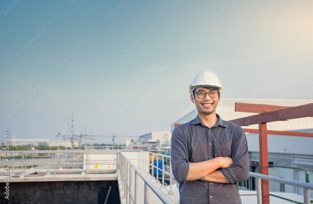 Portrait Asian man Engineer smiling cross arm on cat walk near waste ...