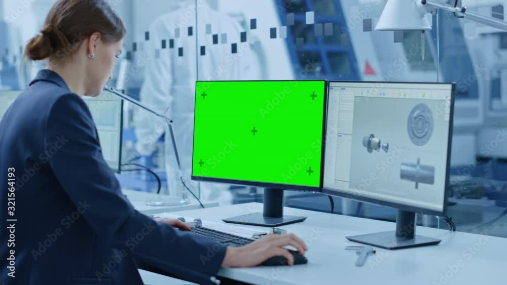 Vidéo Stock Female Engineer Working on a Personal Computer, Two Monitor ...