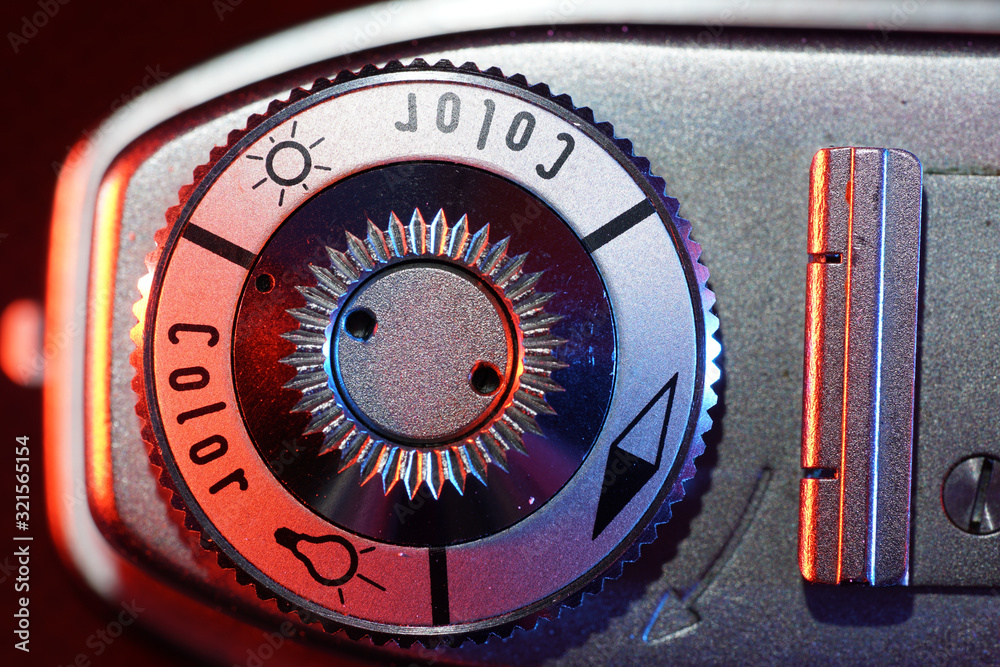 Setting wheel for ISO and aperture on an old camera photographed in the ...