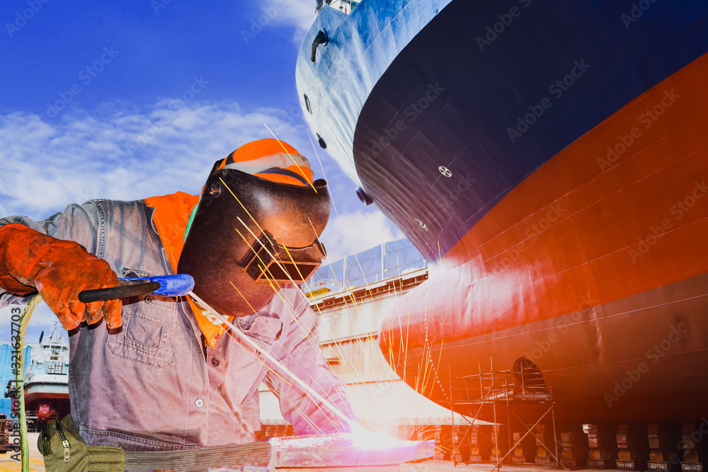 Welder worker industry shipbuilding and ship repair industry at the ...