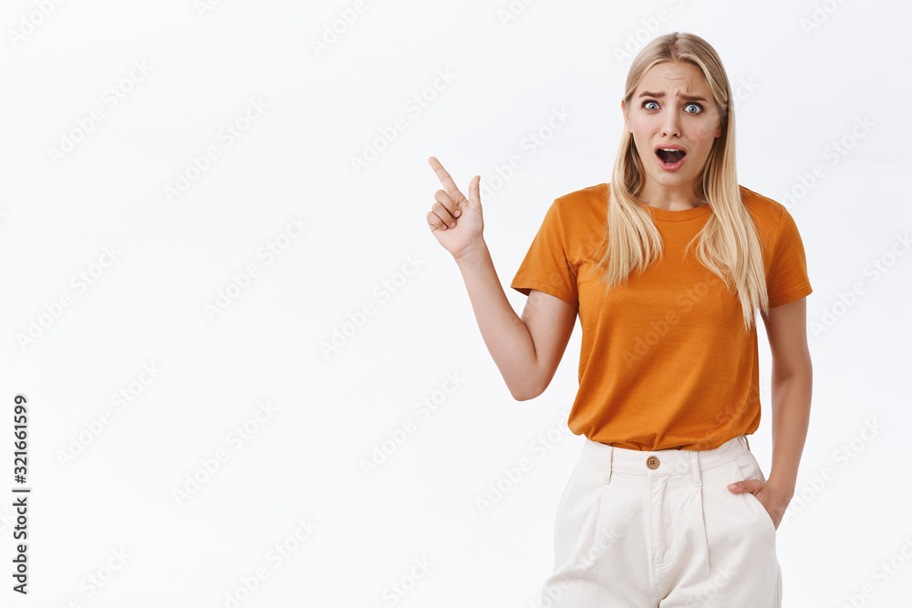 Girl cringes from disgusting scene. Disappointed, bothered attractive ...