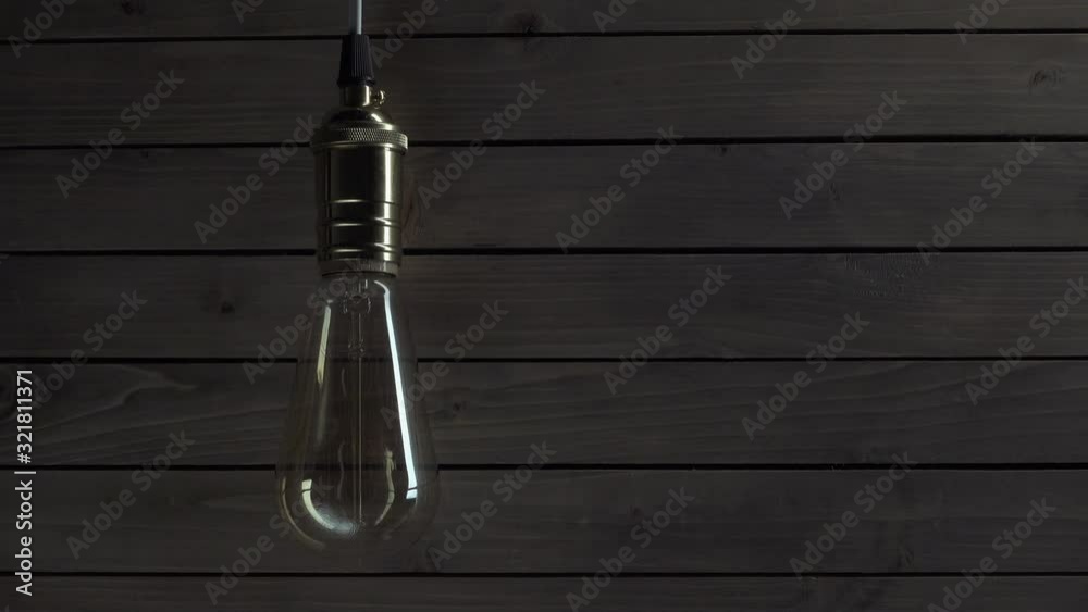 Real Edison light bulb flickering. Vintage filament Edison light bulb ...