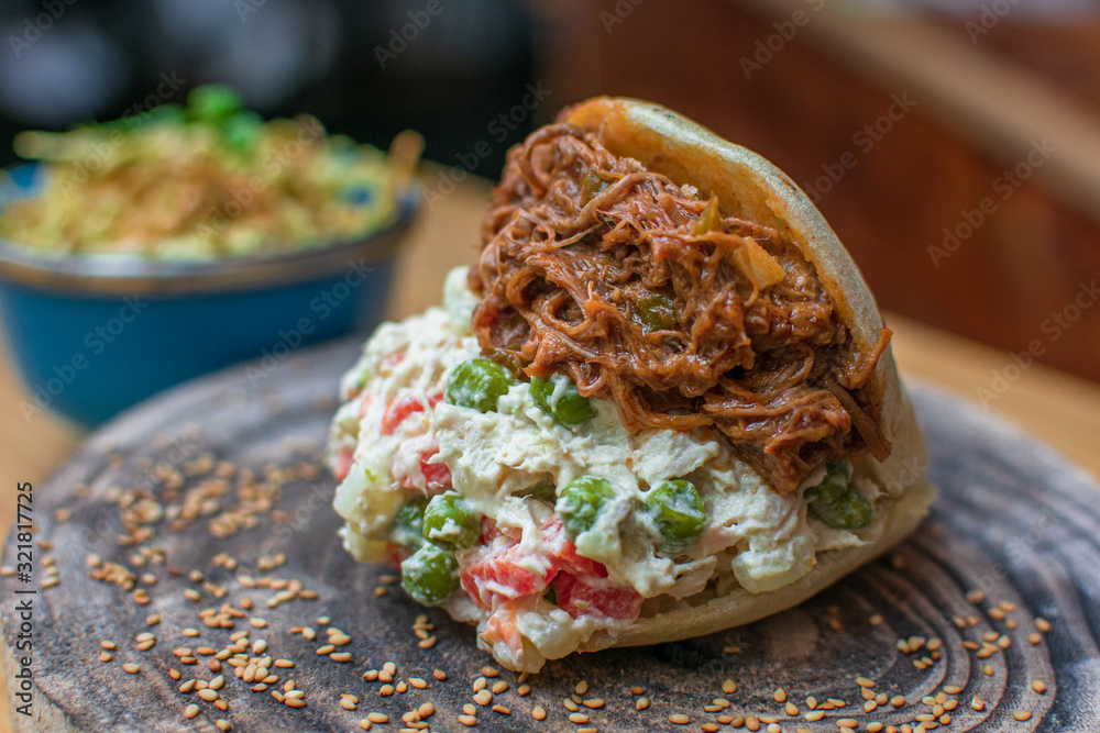 Arepa de carne mechada o Pelua Stock Photo | Adobe Stock