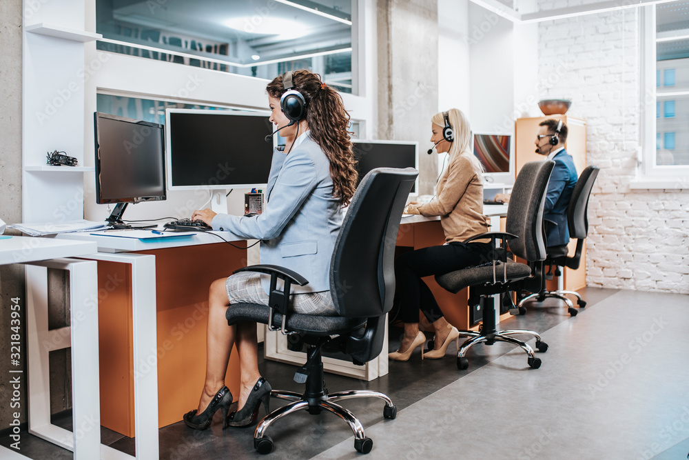 Team of call center employees working together on office. Stock Photo ...