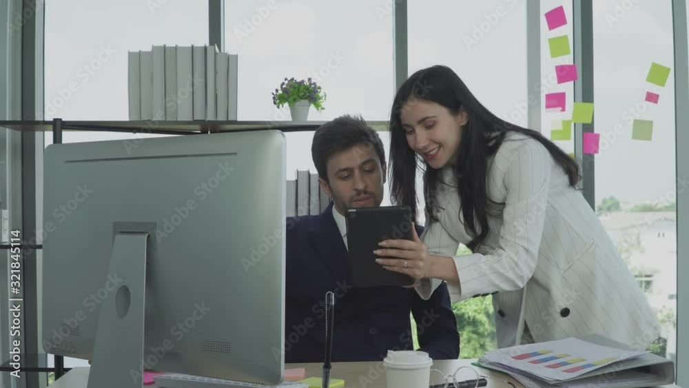 The secretary received good news and she came to tell his manager ...
