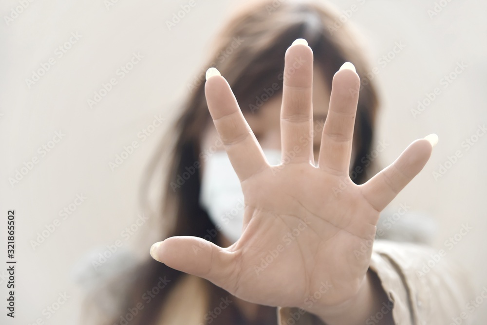 The gesture and expression of stop signaling by raising your hands is ...