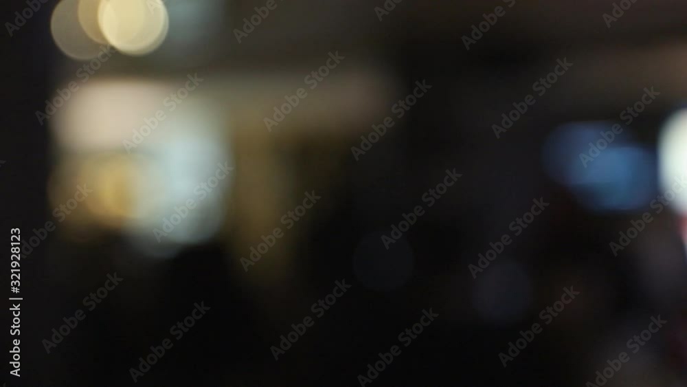 dancing in the club, flashing lights, dancing crowd blurry. Concept of ...