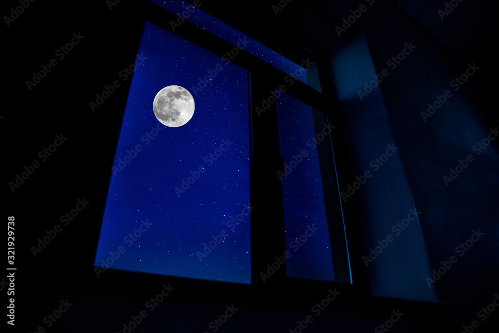 Moonlight inside dark room. Night scene of moon seen through the window ...