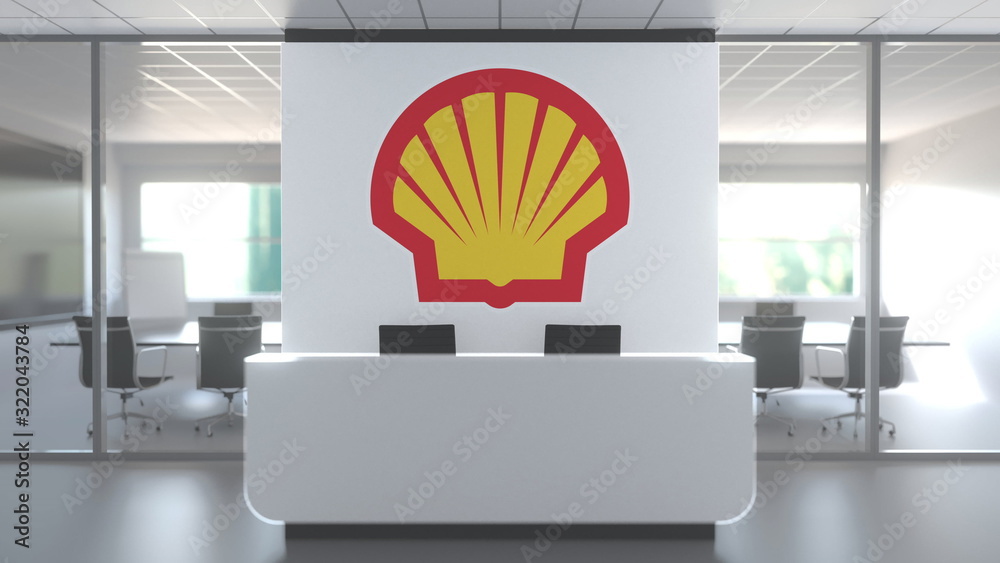 ROYAL DUTCH SHELL PLC logo in modern office and a meeting room ...