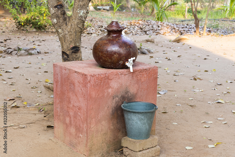 Earthen ware pot hand made and used for holding drinking water with ...