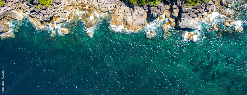 Aerial view of ocean waves, Beautiful tropical beach and rocky ...