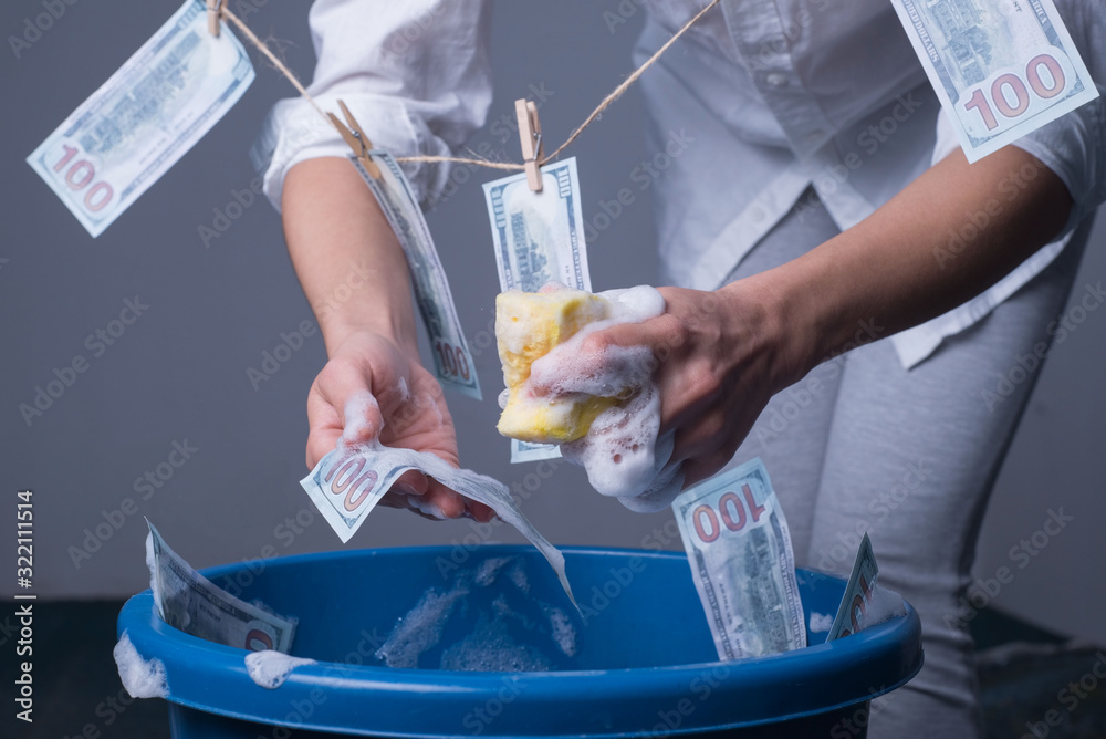 closeup, girl, in the washbasin, using a dishcloth and washing powder ...