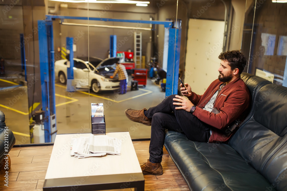 overlooking view of customer in waiting room with glass walls in the ...