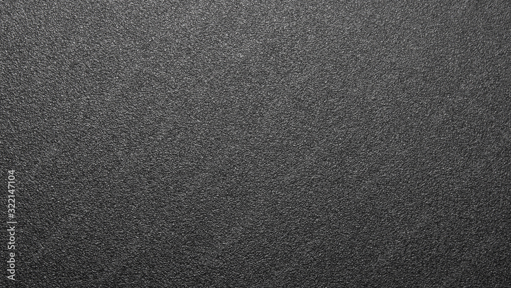 Black rough plastic.The texture is a rough matte plastic.The background ...