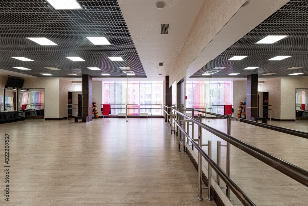 large and light hall with mirrors, music, equipment for dancing, sports ...