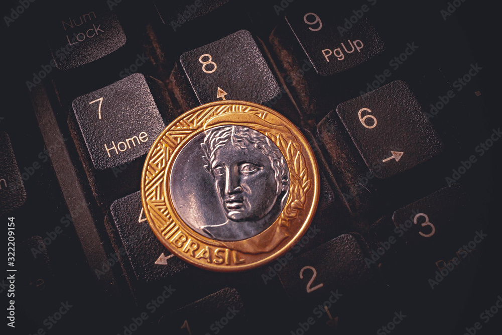Moeda de 1 Real, Moeda brasileira. Foto ilustrativa tendo como cenário ...