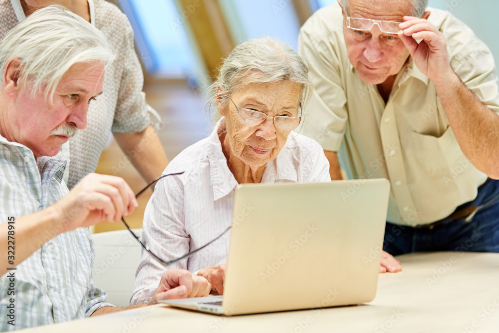 Group of seniors is learning curiously with the laptop Stock Photo ...