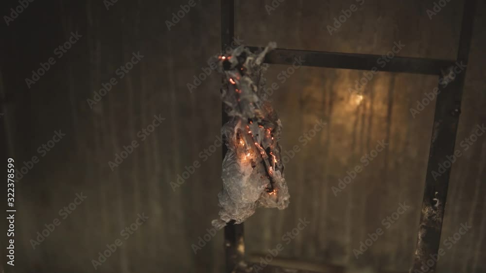 Smoldering materials in a fire test setup. High temperature sample ...