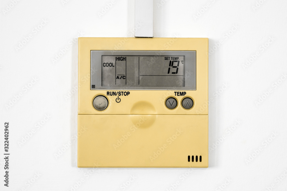 Generic air conditioning temperature control box against a white ...