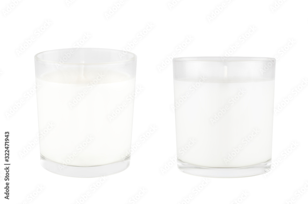 Two white candles in transparent glass isolated, mock up for branding ...