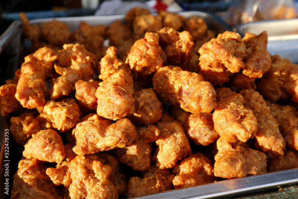 Deep fried chicken neck with breading sold at a street food stall Stock ...