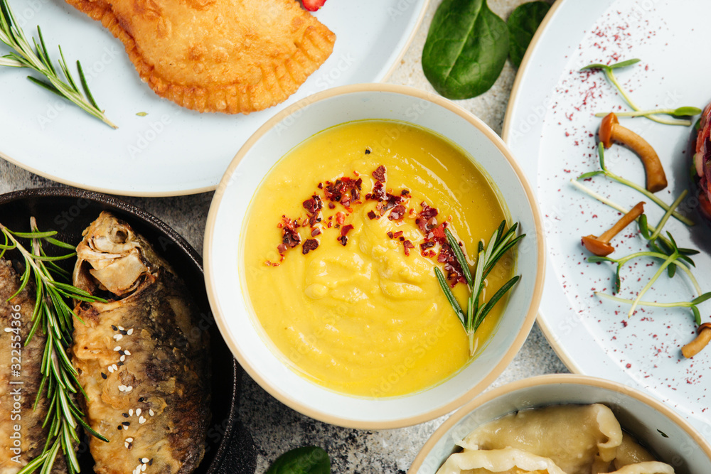 Photo & Art Print different dishes of the lean menu with cream soup and ...