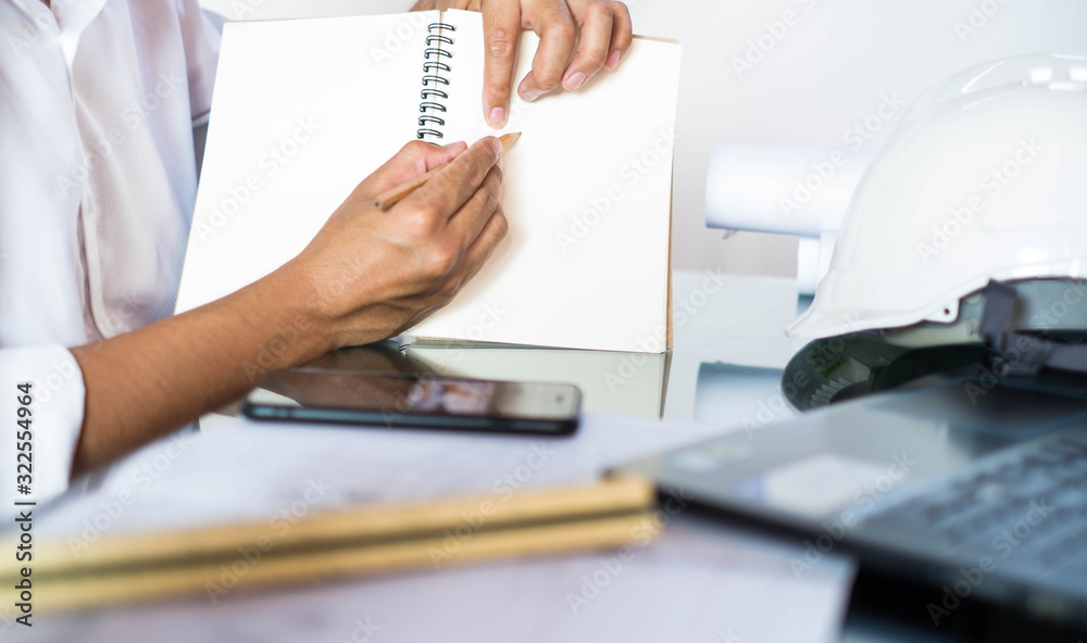 Structural design engineers work in building structure analysis.Closeup ...