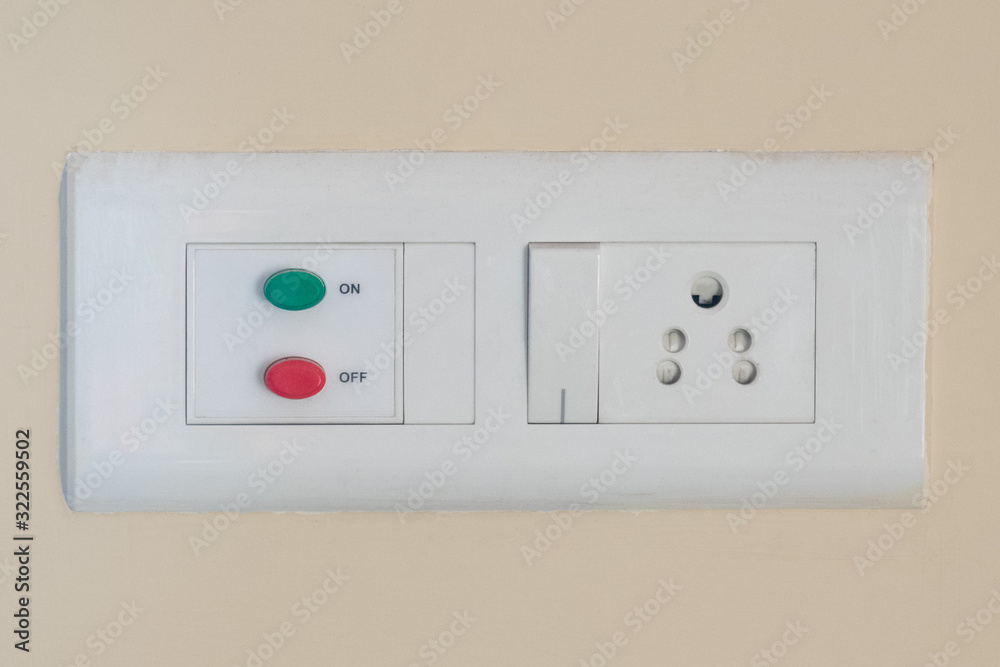 Foto de Modern modular switchboard with on/off switch, 3 pin socket and ...