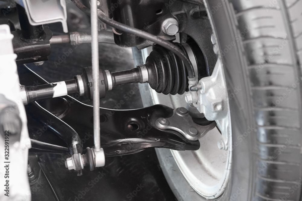 Front car suspension system and drive shaft Stock Photo | Adobe Stock