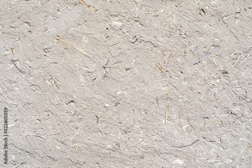 Clay stucco texture with straw. Adobe Stock Photo | Adobe Stock