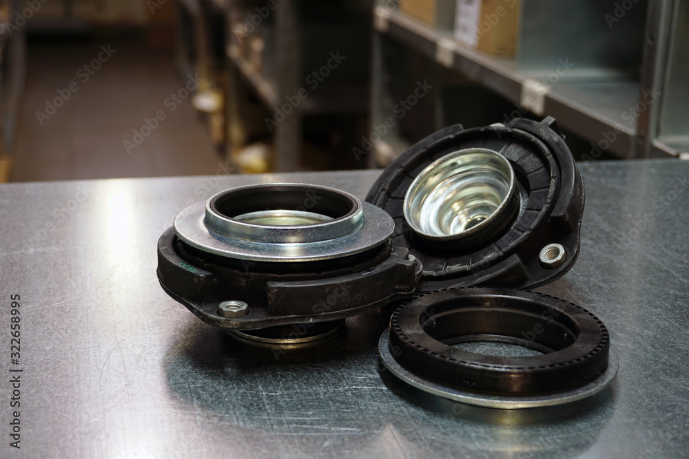 Details of a front or rear suspension of a modern car. Supports and ...