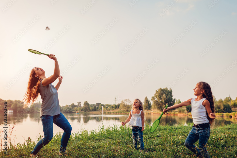 Family Playing Badminton