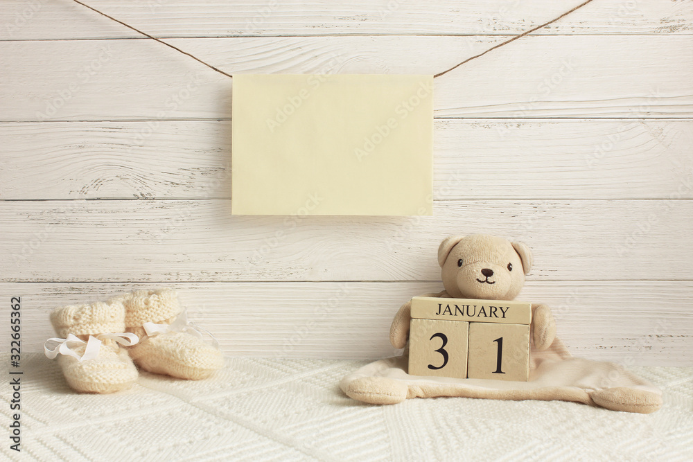 Calendar. January 31th. Day 31th of month. Teddy bear holding wood cube ...