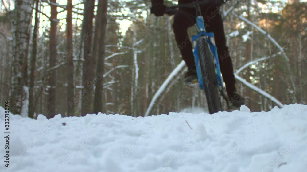 Cycling in the winter. Skid of the bike. Slow motion 4x. Close-up of ...
