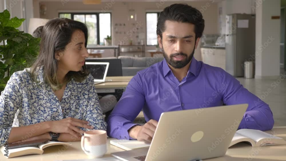 close up shot of a young Indian male and a young Indian female ...