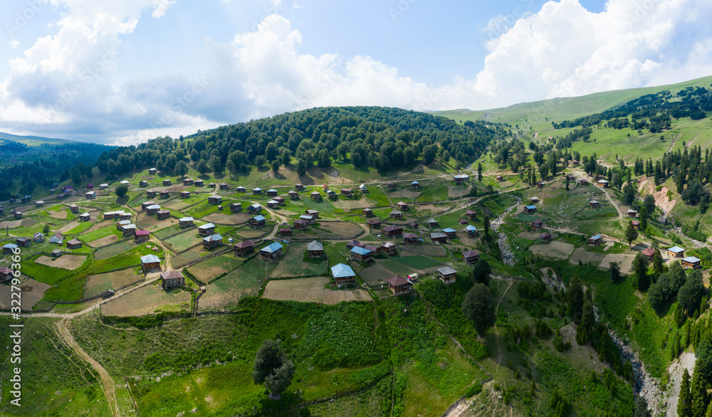 Beautiful nature with country cottages and traditional wooden houses on ...