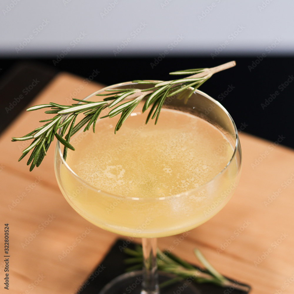 Bucket List Cocktail using Rosemary, Genepi and Vodka Stock Photo ...