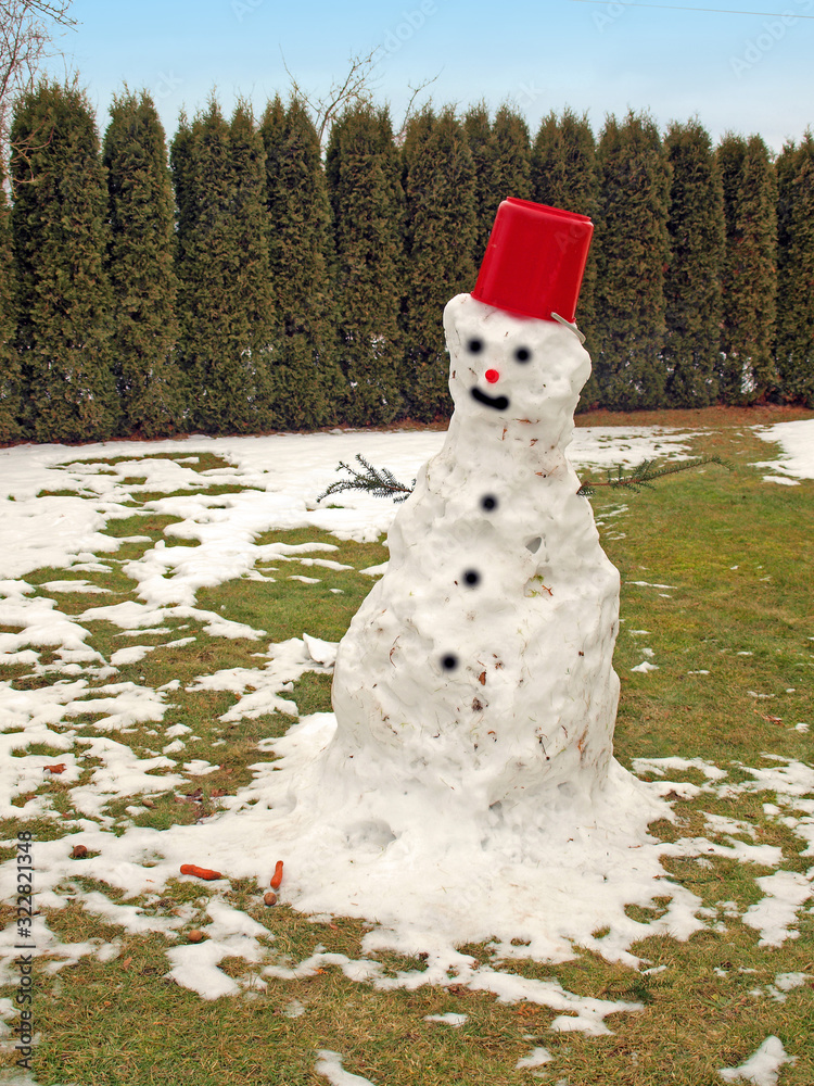 Melting snowman Stock Photo | Adobe Stock