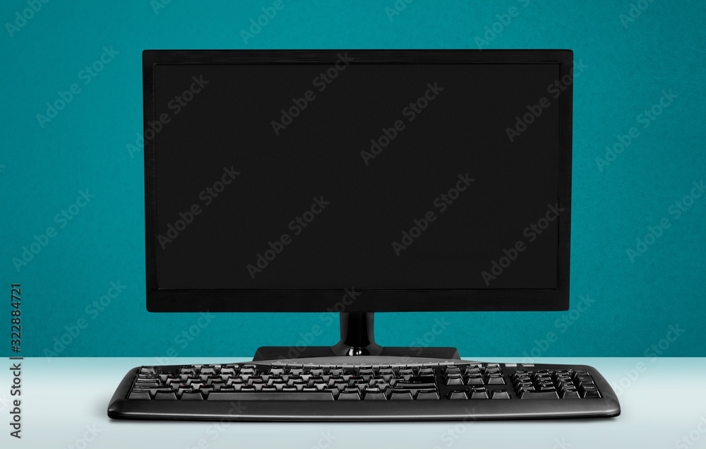Modern desktop computer and keyboard on the desk Stock Photo | Adobe Stock