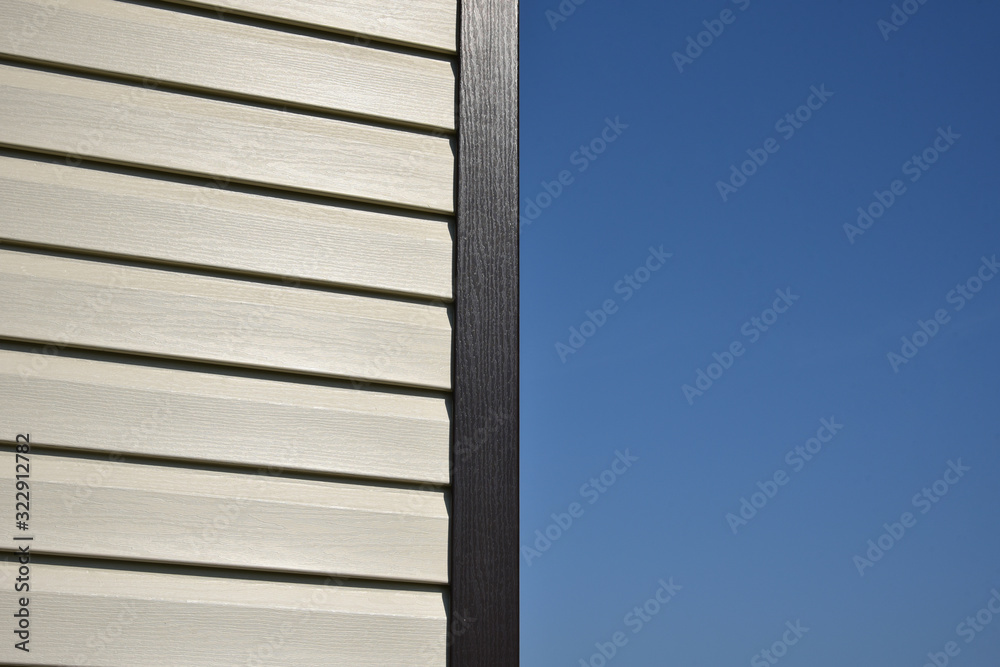 White vinyl siding wall surface with horizontal lines. texture of ...