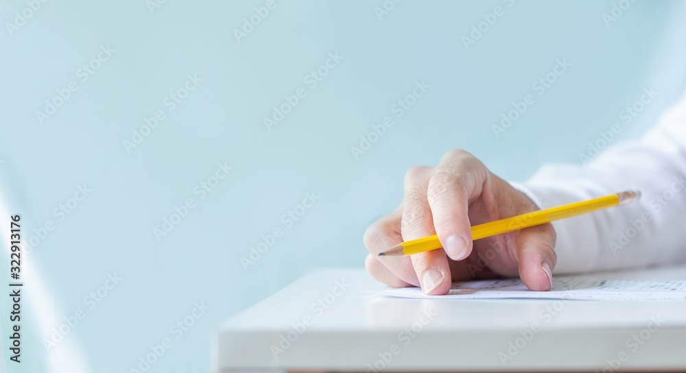 high school,university student study.hands holding pencil writing paper ...