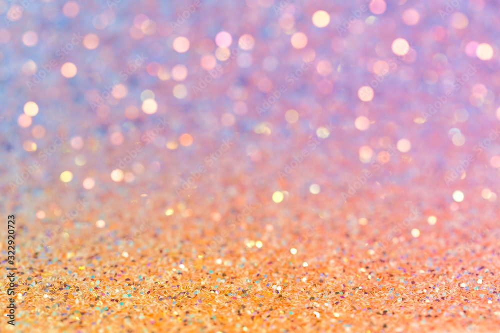 Abstract photo background with sparkling sequins, orange-blue color ...