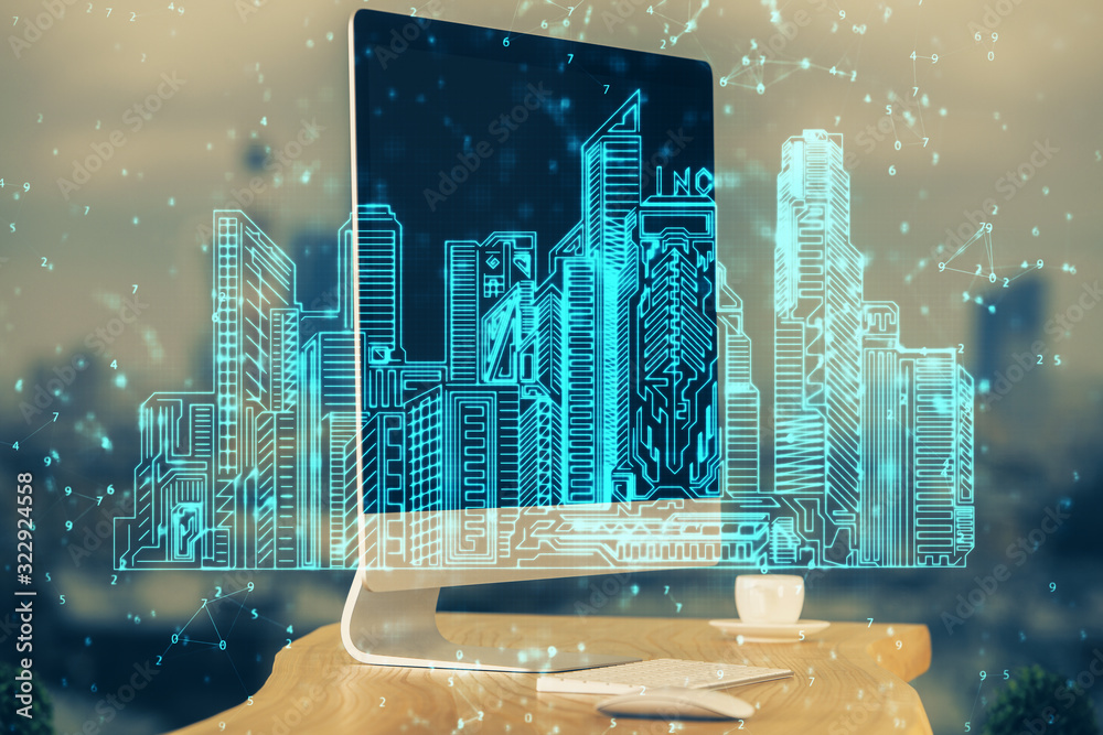 Desktop computer background in office and big town buildings hologram ...