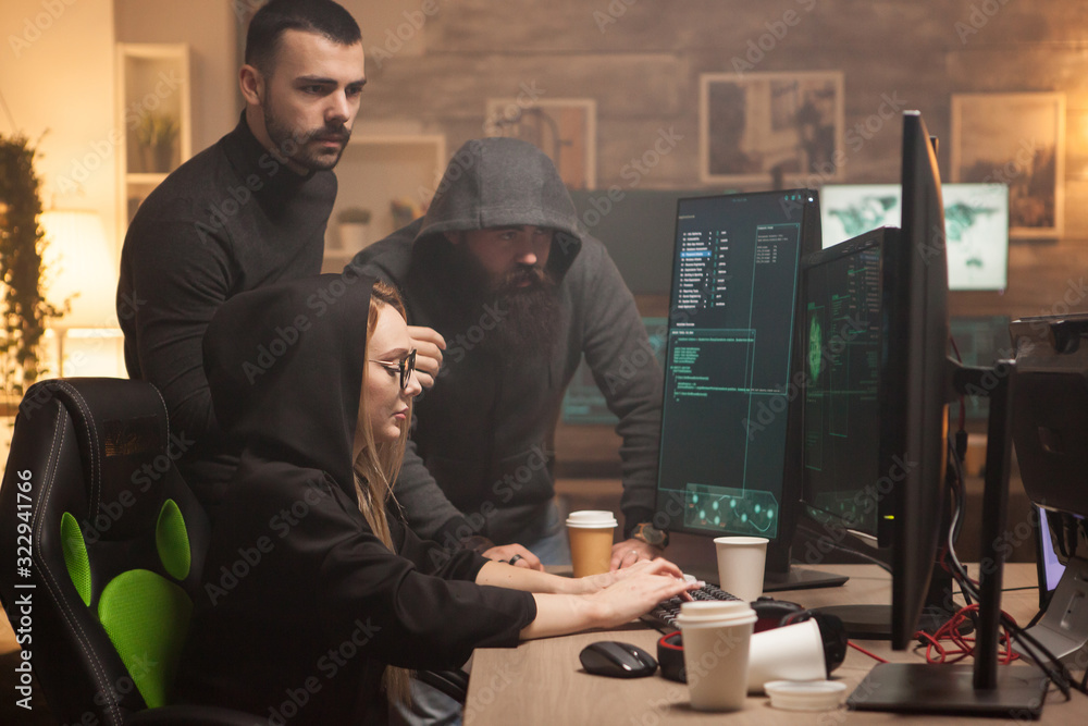 Team of hackers hired by government to test their firewall Stock Photo ...