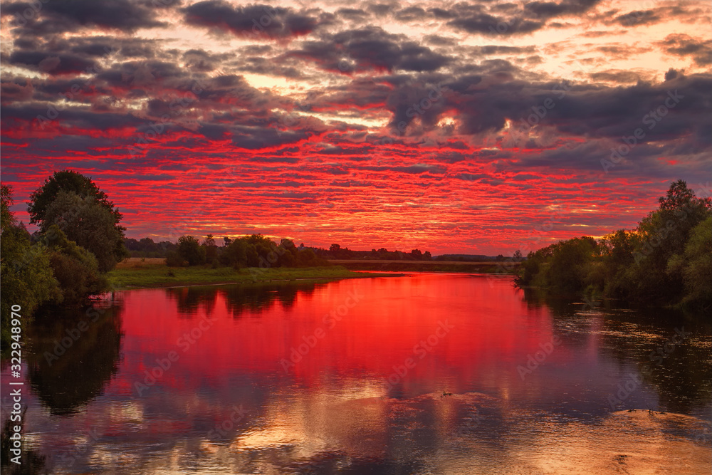 Beautiful sunrise with red purple sky cloud over the river Stock Photo ...
