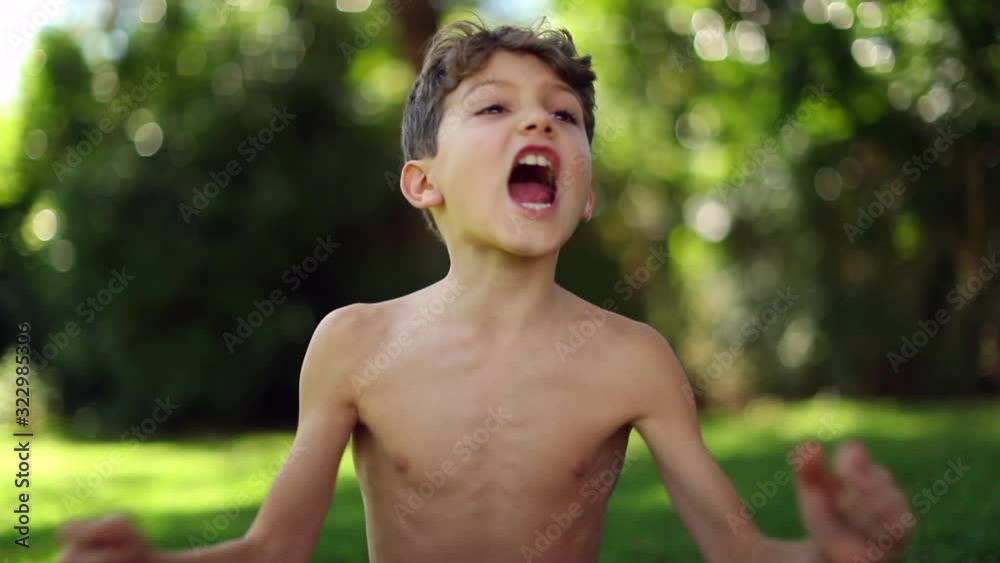 Child boy screaming from top of his lungs in slow-motion 120fps. Kid ...