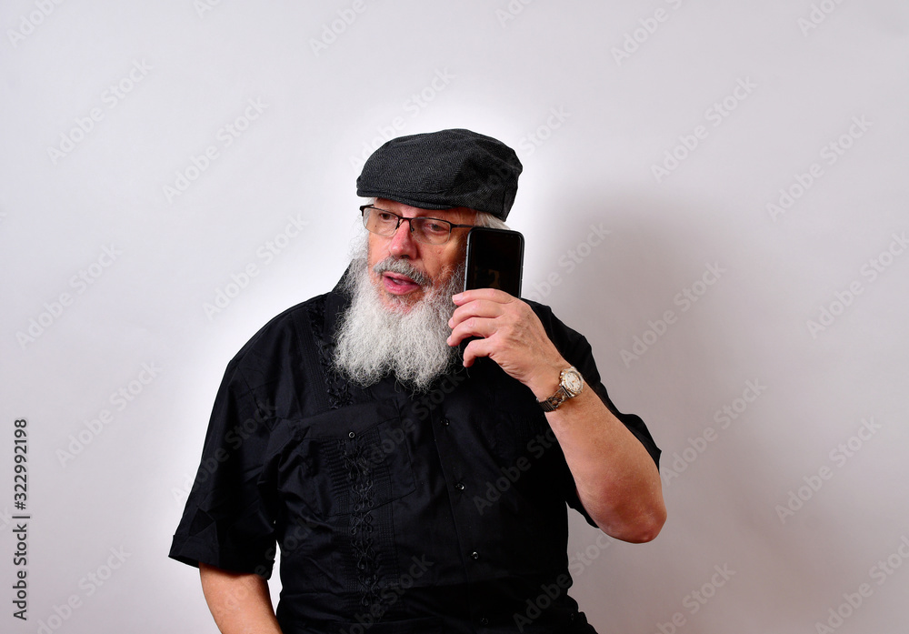 Old man on the phone.Senior gentleman using his smartphone.Elderly man ...